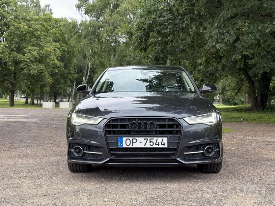 Black Audi A6 2016 in Riga, with an engine capacity of 2.00 L and mileage of 171 thousand km for 19300 €, photo 4 on AUTOMOTO.COM.LV