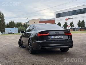 Black Audi A6 2016 in Riga, with an engine capacity of 2.00 L and mileage of 171 thousand km for 19300 €, photo 6 on AUTOMOTO.COM.LV