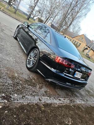 Melns Audi A6 2016 Alīta, ar dzinēja tilpumu 1.98 L un nobraukumu 310 tūkst. km par 12000 €, foto 9 vietnē AUTOMOTO.COM.LV