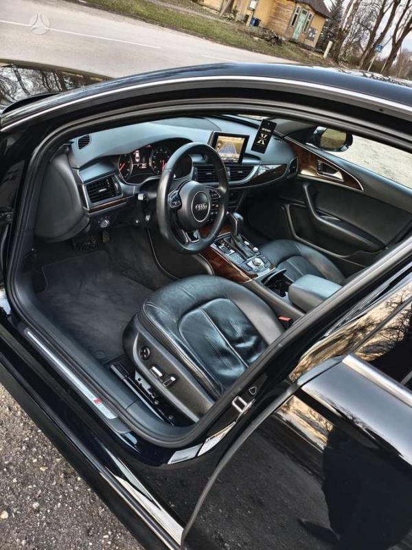 Melns Audi A6 2016 Alīta, ar dzinēja tilpumu 1.98 L un nobraukumu 310 tūkst. km par 12000 €, foto 10 vietnē AUTOMOTO.COM.LV