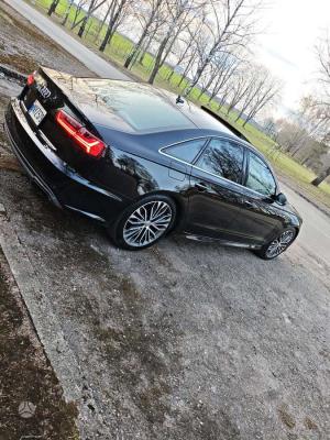 Melns Audi A6 2016 Alīta, ar dzinēja tilpumu 1.98 L un nobraukumu 310 tūkst. km par 12000 €, foto 16 vietnē AUTOMOTO.COM.LV