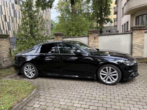 Black Audi A6 2017 in Riga, with an engine capacity of 2.00 L and mileage of 150 thousand km for 19199 €, photo 2 on AUTOMOTO.COM.LV