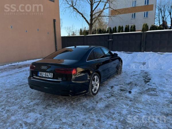 Black Audi A6 2017 in Riga, with an engine capacity of 1.80 L and mileage of 150 thousand km for 13799 €, photo 3 on AUTOMOTO.COM.LV
