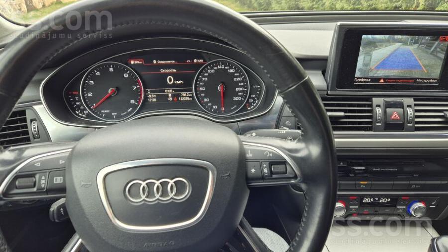 Black Audi A6 2017 in Riga, with an engine capacity of 1.80 L and mileage of 122 thousand km for 14500 €, photo 6 on AUTOMOTO.COM.LV