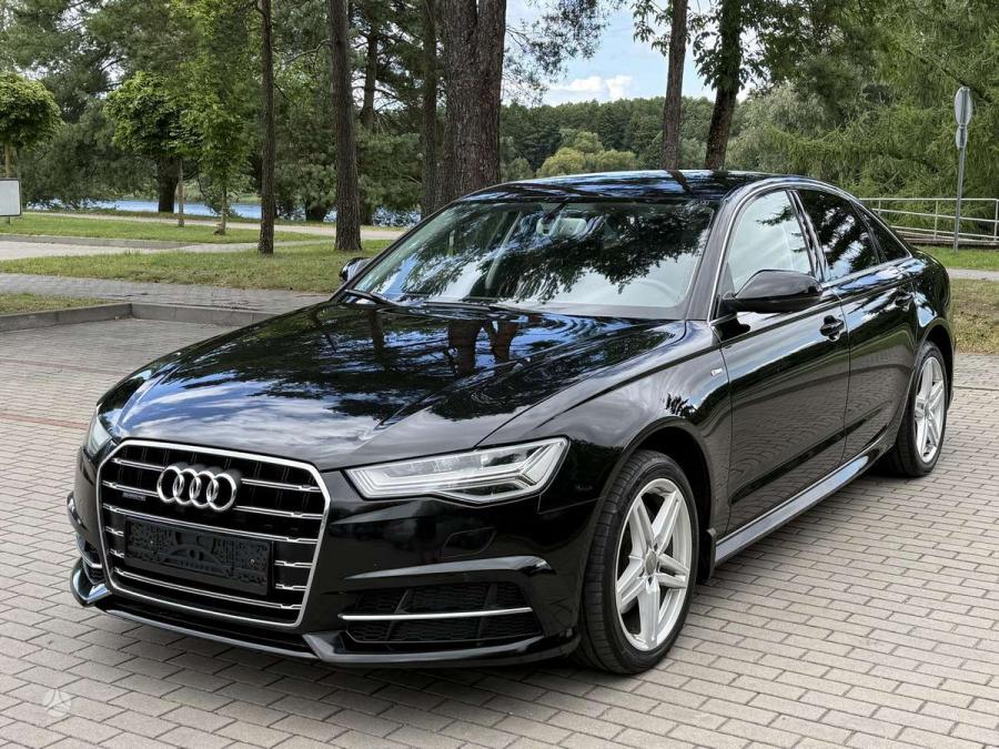 Black Audi A6 2017 in Prienai, with an engine capacity of 2.00 L and mileage of 290 thousand km for 14200 €, photo 12 on AUTOMOTO.COM.LV