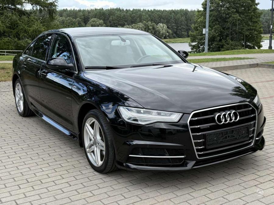 Black Audi A6 2017 in Prienai, with an engine capacity of 2.00 L and mileage of 290 thousand km for 14200 €, photo 14 on AUTOMOTO.COM.LV