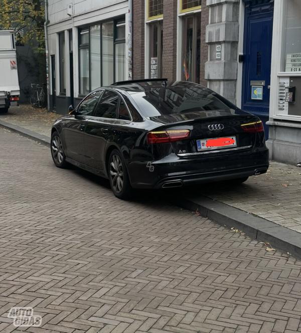 Audi A6 2017 Klaipėda vietnē Melns Audi A6 2017 Klaipėda, ar dzinēja tilpumu 2.00 L un nobraukumu 182 tūkst. km par 12600 €, foto 6 vietnē AUTOMOTO.COM.LV