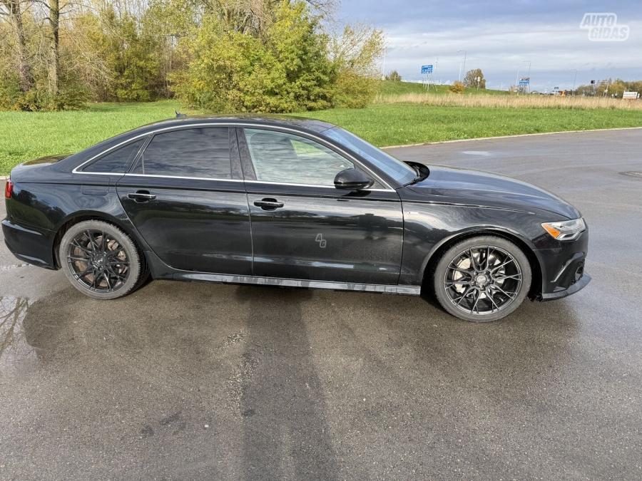Black Audi A6 2017 in Klaipeda, with an engine capacity of 2.00 L and mileage of 122 thousand km for 15650 €, photo 7 on AUTOMOTO.COM.LV
