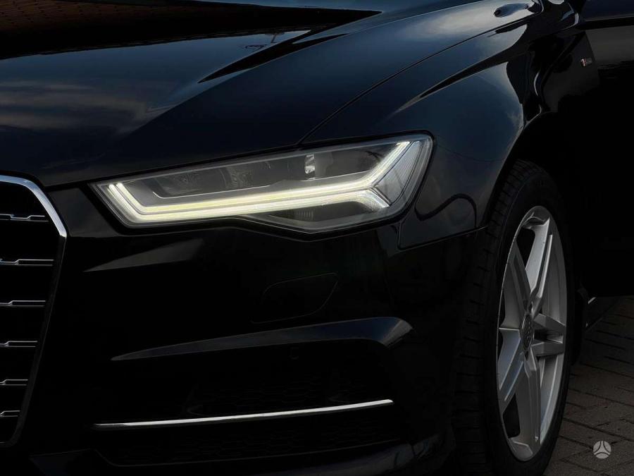 Black Audi A6 2018 in Jonava, with an engine capacity of 1.97 L and mileage of 209 thousand km for 14750 €, photo 13 on AUTOMOTO.COM.LV