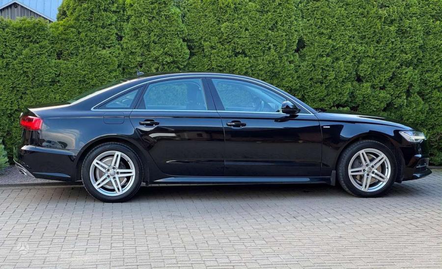 Black Audi A6 2018 in Jonava, with an engine capacity of 1.97 L and mileage of 209 thousand km for 14750 €, photo 14 on AUTOMOTO.COM.LV
