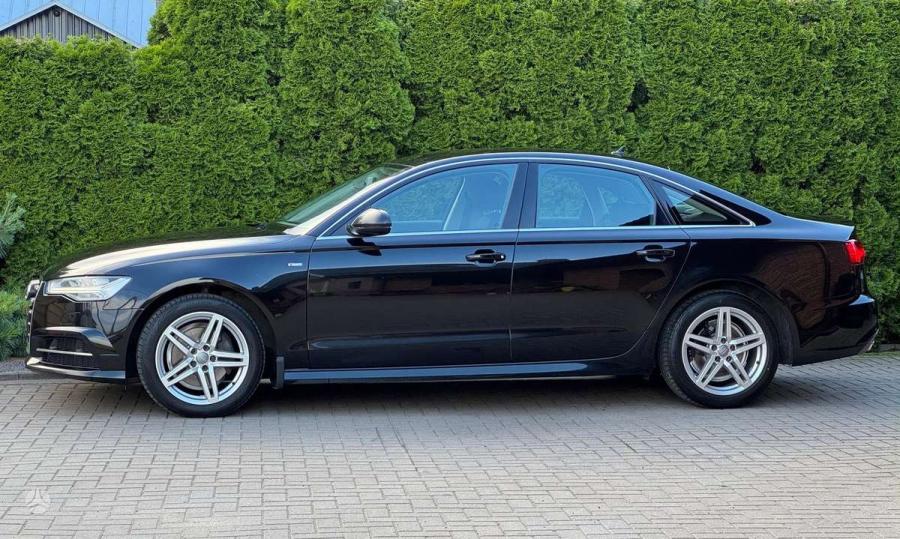 Black Audi A6 2018 in Jonava, with an engine capacity of 1.97 L and mileage of 209 thousand km for 14750 €, photo 15 on AUTOMOTO.COM.LV