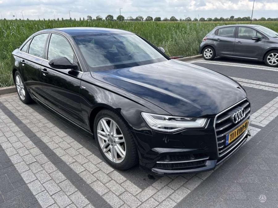 Black Audi A6 2018 in Marijampole, with an engine capacity of 2.00 L and mileage of 300 thousand km for 13950 €, photo 3 on AUTOMOTO.COM.LV