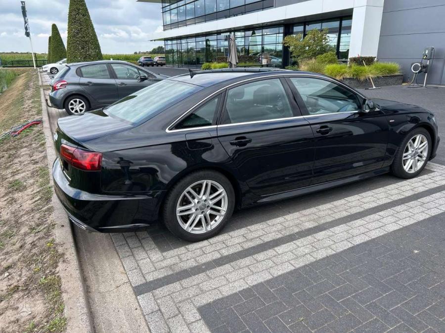 Black Audi A6 2018 in Marijampole, with an engine capacity of 2.00 L and mileage of 300 thousand km for 13950 €, photo 4 on AUTOMOTO.COM.LV