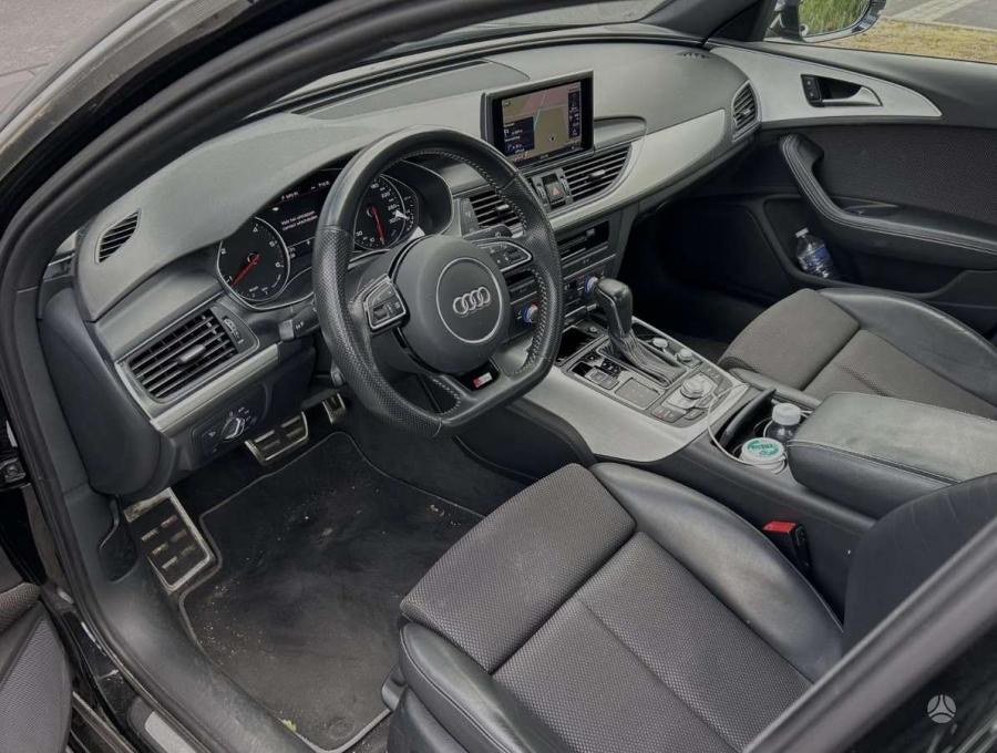 Black Audi A6 2018 in Marijampole, with an engine capacity of 2.00 L and mileage of 300 thousand km for 13950 €, photo 5 on AUTOMOTO.COM.LV