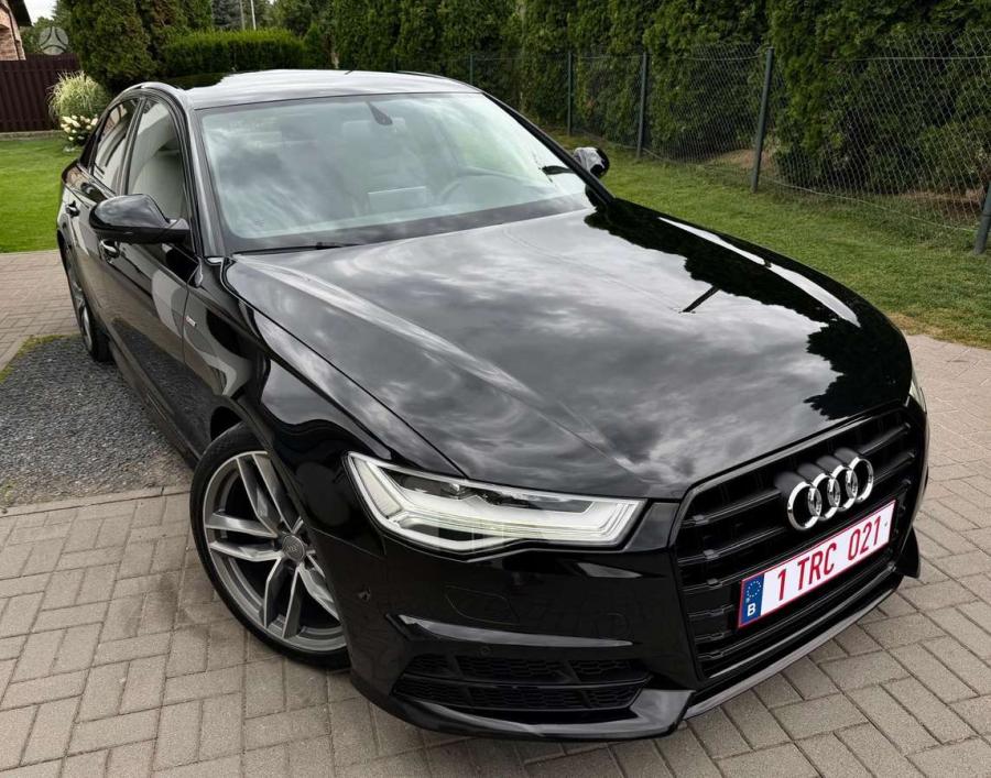 Black Audi A6 2018 in Kaunas, with an engine capacity of 2.00 L and mileage of 213 thousand km for 17350 €, photo 28 on AUTOMOTO.COM.LV