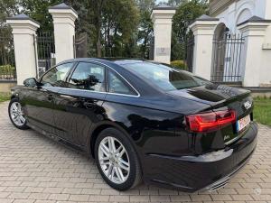 Black Audi A6 2018 in Vilnius, with an engine capacity of 2.00 L and mileage of 300 thousand km for 13999 €, photo 15 on AUTOMOTO.COM.LV