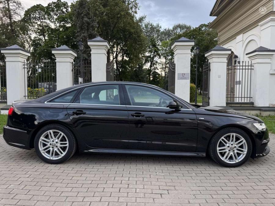 Black Audi A6 2018 in Vilnius, with an engine capacity of 2.00 L and mileage of 300 thousand km for 13999 €, photo 33 on AUTOMOTO.COM.LV