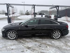 Black Audi A6 2022 in Kaunas, with an engine capacity of 2.00 L and mileage of 96 thousand km for 28750 €, photo 2 on AUTOMOTO.COM.LV