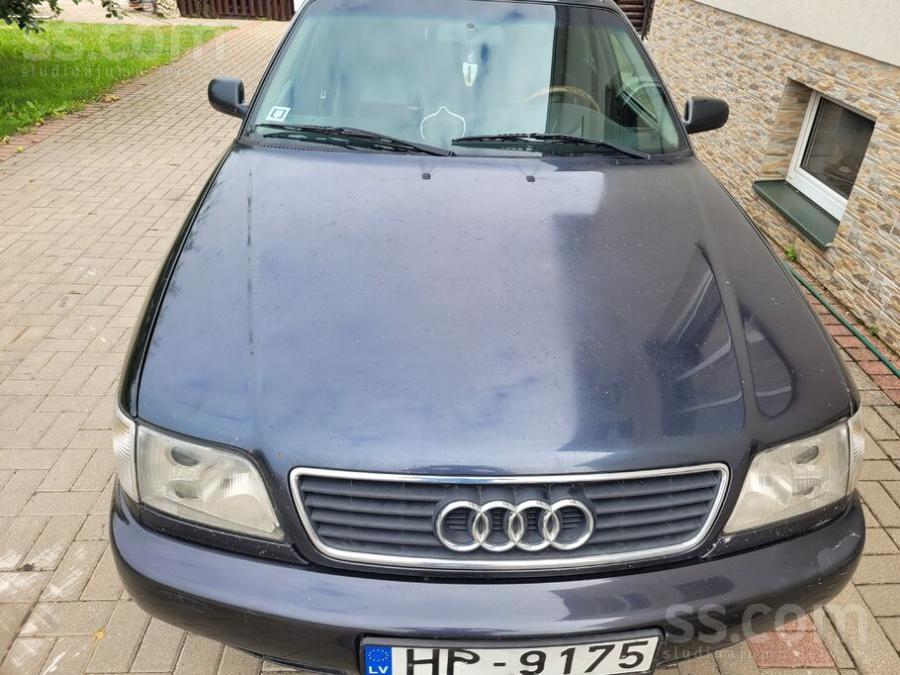 Black Audi A6 1996 in Rezekne, with an engine capacity of 2.50 L and mileage of 400 thousand km for 1900 €, photo 1 on AUTOMOTO.COM.LV