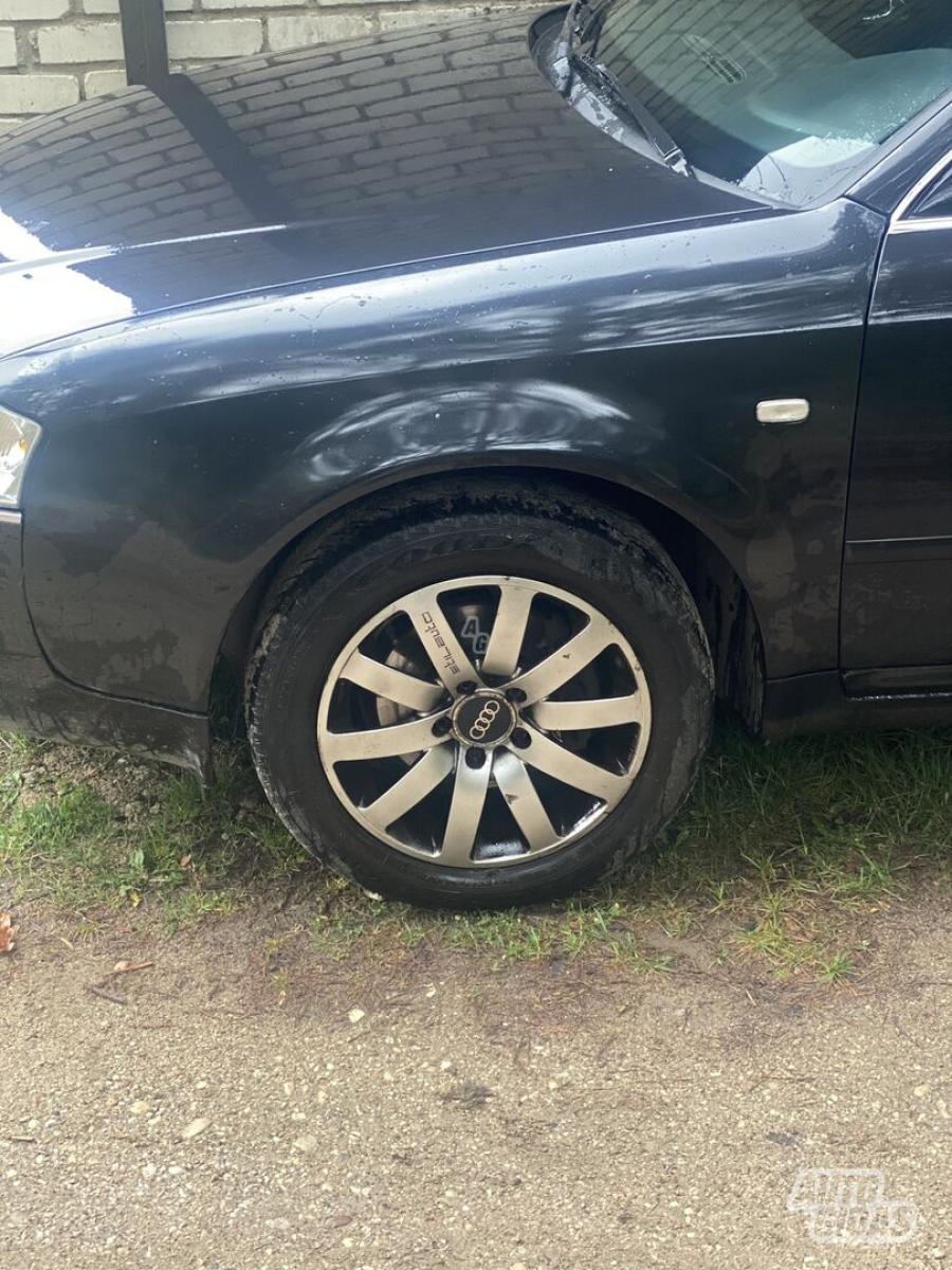 Black Audi A6 2000 in Kaunas, with an engine capacity of 2.40 L and mileage of 270 thousand km for 650 €, photo 6 on AUTOMOTO.COM.LV