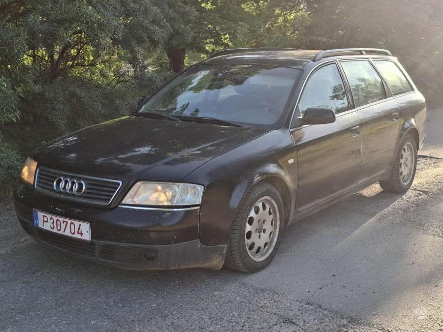Black Audi A6 2000 in Plunge, with an engine capacity of 2.50 L and mileage of 342 thousand km for 650 €, photo 1 on AUTOMOTO.COM.LV