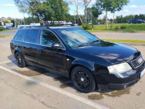 Black Audi A6 2000 in Siauliai, with an engine capacity of 2.50 L and mileage of 311 thousand km for 850 €, photo 3 on AUTOMOTO.COM.LV