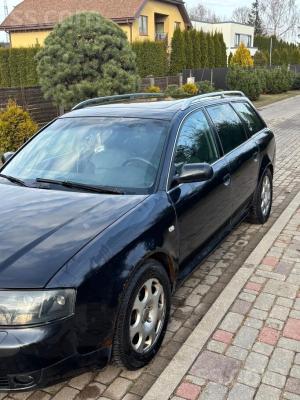 Black Audi A6 2001 in Riga, with an engine capacity of 2.50 L and mileage of 555 thousand km for 1350 €, photo 4 on AUTOMOTO.COM.LV