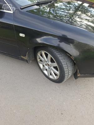 Black Audi A6 2003 in Siauliai, with an engine capacity of 2.50 L and mileage of 320 thousand km for 780 €, photo 15 on AUTOMOTO.COM.LV