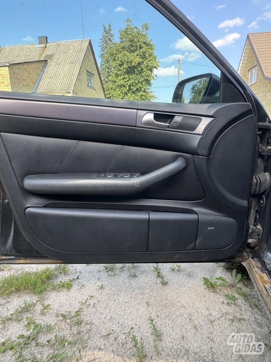 Melns Audi A6 2003 Panevēža, ar dzinēja tilpumu 2.50 L un nobraukumu 440 tūkst. km par 1600 €, foto 9 vietnē AUTOMOTO.COM.LV