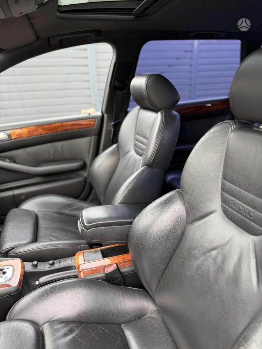 Black Audi A6 2003 in Kaunas, with an engine capacity of 2.50 L and mileage of 321 thousand km for 1390 €, photo 14 on AUTOMOTO.COM.LV