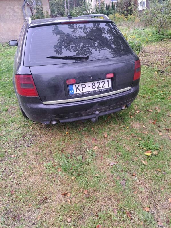 Black Audi A6 2004 in Riga, with an engine capacity of 2.50 L and mileage of 333 thousand km for 1950 €, photo 1 on AUTOMOTO.COM.LV