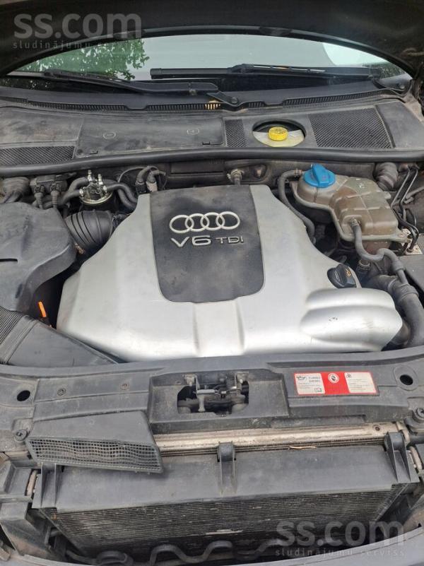 Black Audi A6 2004 in Riga, with an engine capacity of 2.50 L and mileage of 333 thousand km for 1950 €, photo 3 on AUTOMOTO.COM.LV