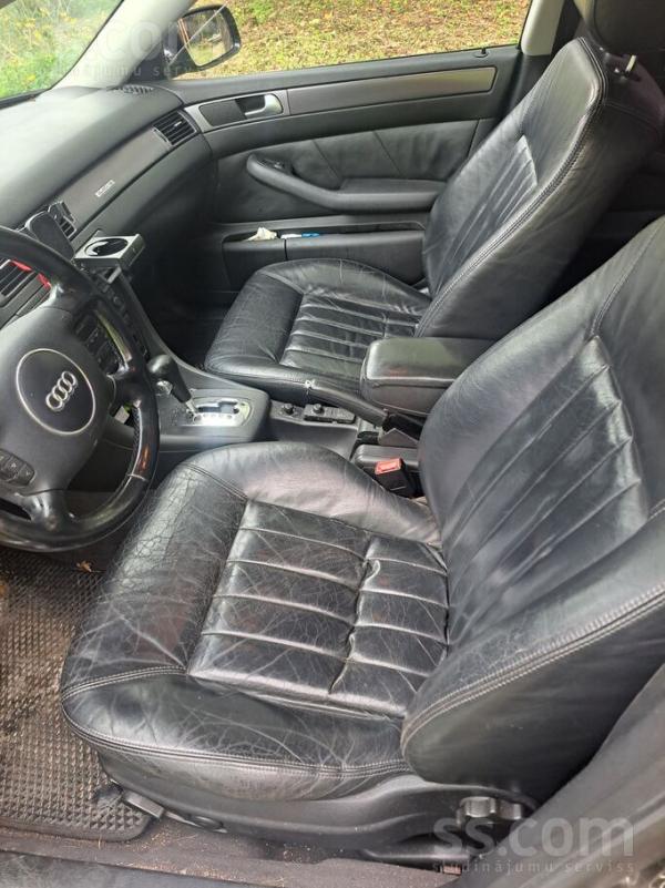 Black Audi A6 2004 in Riga, with an engine capacity of 2.50 L and mileage of 333 thousand km for 1950 €, photo 5 on AUTOMOTO.COM.LV