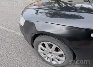 Black Audi A6 2005 in Daugavpils, with an engine capacity of 2.00 L and mileage of 411 thousand km for 1090 €, photo 12 on AUTOMOTO.COM.LV
