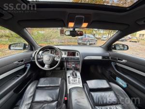 Melns Audi A6 2006 Rīga, ar dzinēja tilpumu 3.00 L un nobraukumu 401 tūkst. km par 2880 €, foto 9 vietnē AUTOMOTO.COM.LV