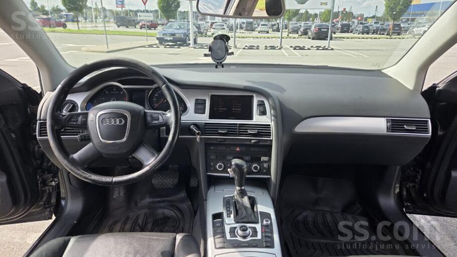 Black Audi A6 2008 in Riga, with an engine capacity of 2.00 L and mileage of 306 thousand km for 2600 €, photo 14 on AUTOMOTO.COM.LV