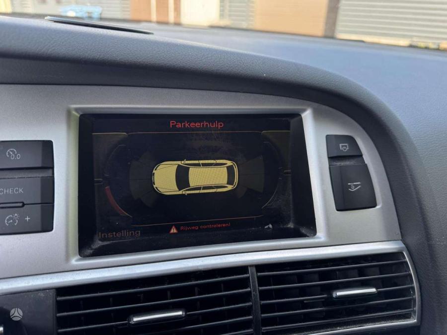 Black Audi A6 2009 in Alytus, with an engine capacity of 3.00 L and mileage of 298 thousand km for 4450 €, photo 15 on AUTOMOTO.COM.LV
