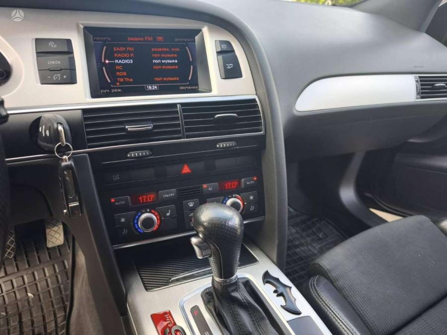 Black Audi A6 2010 in Siauliai, with an engine capacity of 1.97 L and mileage of 322 thousand km for 5999 €, photo 6 on AUTOMOTO.COM.LV