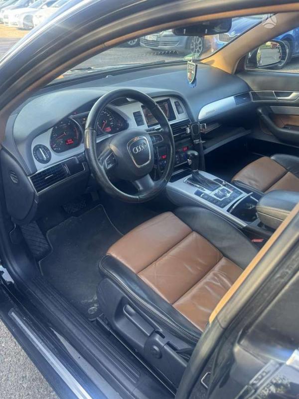 Black Audi A6 2010 in Klaipeda, with an engine capacity of 2.97 L and mileage of 296 thousand km for 6400 €, photo 7 on AUTOMOTO.COM.LV
