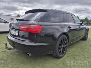 Black Audi A6 2011 in Liepaja, with an engine capacity of 3.00 L and mileage of 331 thousand km for 10500 €, photo 5 on AUTOMOTO.COM.LV