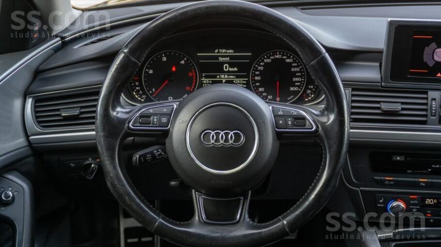 Black Audi A6 2011 in Riga, with an engine capacity of 3.00 L and mileage of 285 thousand km for 8990 €, photo 14 on AUTOMOTO.COM.LV