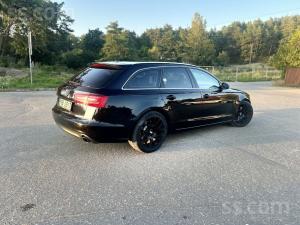 Black Audi A6 2011 in Riga, with an engine capacity of 3.00 L and mileage of 291 thousand km for 6750 €, photo 3 on AUTOMOTO.COM.LV