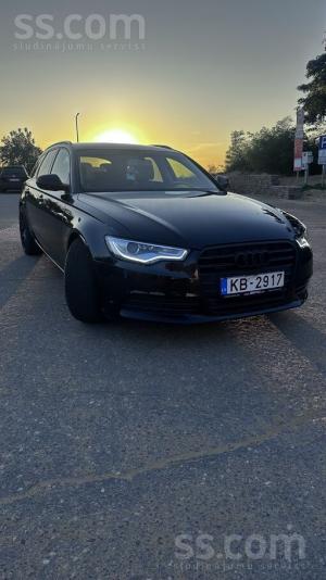 Black Audi A6 2011 in Riga, with an engine capacity of 3.00 L and mileage of 291 thousand km for 6750 €, photo 6 on AUTOMOTO.COM.LV