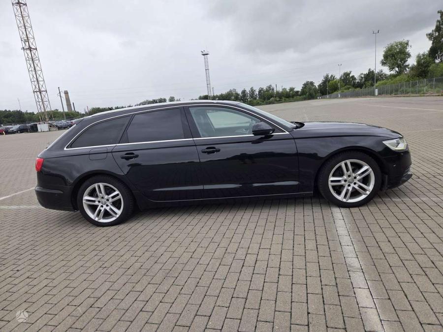 Black Audi A6 2011 in Marijampole, with an engine capacity of 3.00 L and mileage of 287 thousand km for 7350 €, photo 4 on AUTOMOTO.COM.LV