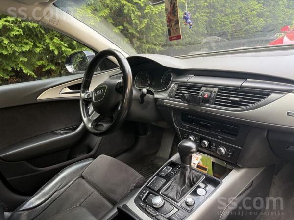 Black Audi A6 2011 in Limbazi, with an engine capacity of 3.00 L and mileage of 286 thousand km for 8777 €, photo 5 on AUTOMOTO.COM.LV