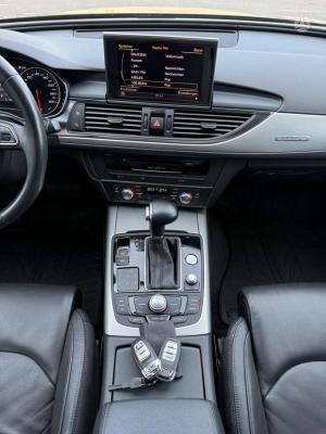 Black Audi A6 2011 in Kaunas, with an engine capacity of 2.97 L and mileage of 290 thousand km for 9490 €, photo 18 on AUTOMOTO.COM.LV
