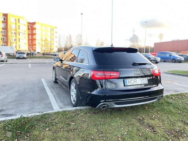 Black Audi A6 2012 in Vilnius, with an engine capacity of 2.97 L and mileage of 328 thousand km for 10777 €, photo 8 on AUTOMOTO.COM.LV