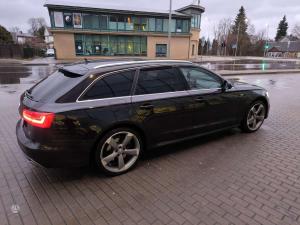 Black Audi A6 2012 in Utena, with an engine capacity of 2.97 L and mileage of 325 thousand km for 12750 €, photo 13 on AUTOMOTO.COM.LV