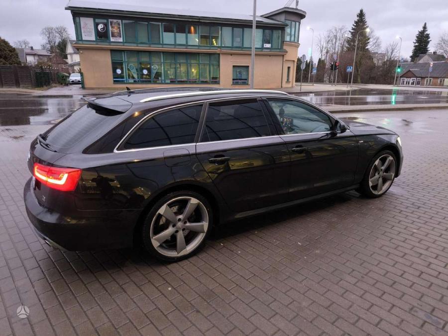 Black Audi A6 2012 in Utena, with an engine capacity of 2.97 L and mileage of 325 thousand km for 12750 €, photo 13 on AUTOMOTO.COM.LV
