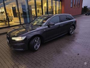 Black Audi A6 2012 in Utena, with an engine capacity of 2.97 L and mileage of 325 thousand km for 12750 €, photo 14 on AUTOMOTO.COM.LV